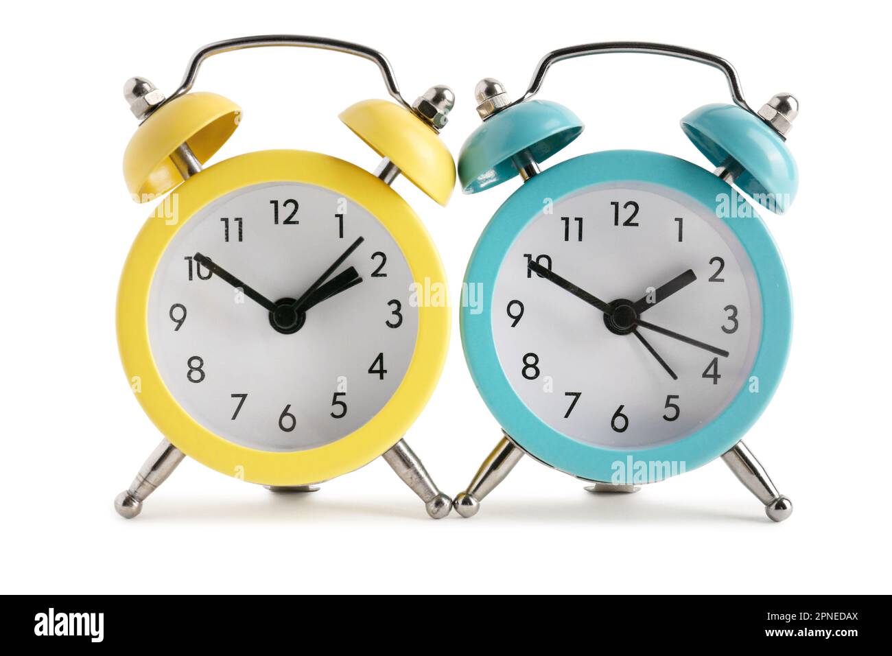 Colorful alarm clocks isolated on white background Stock Photo - Alamy
