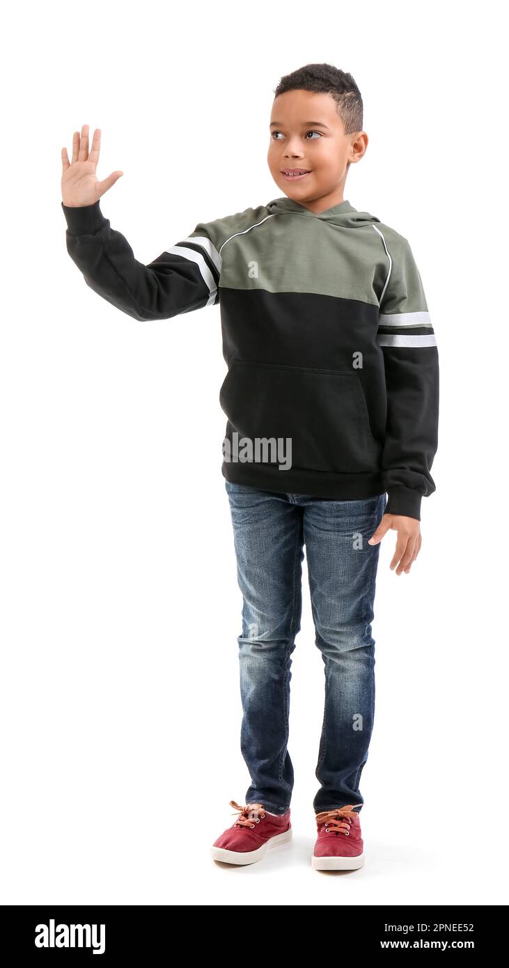 Little African-American boy waving hand on white background Stock Photo ...