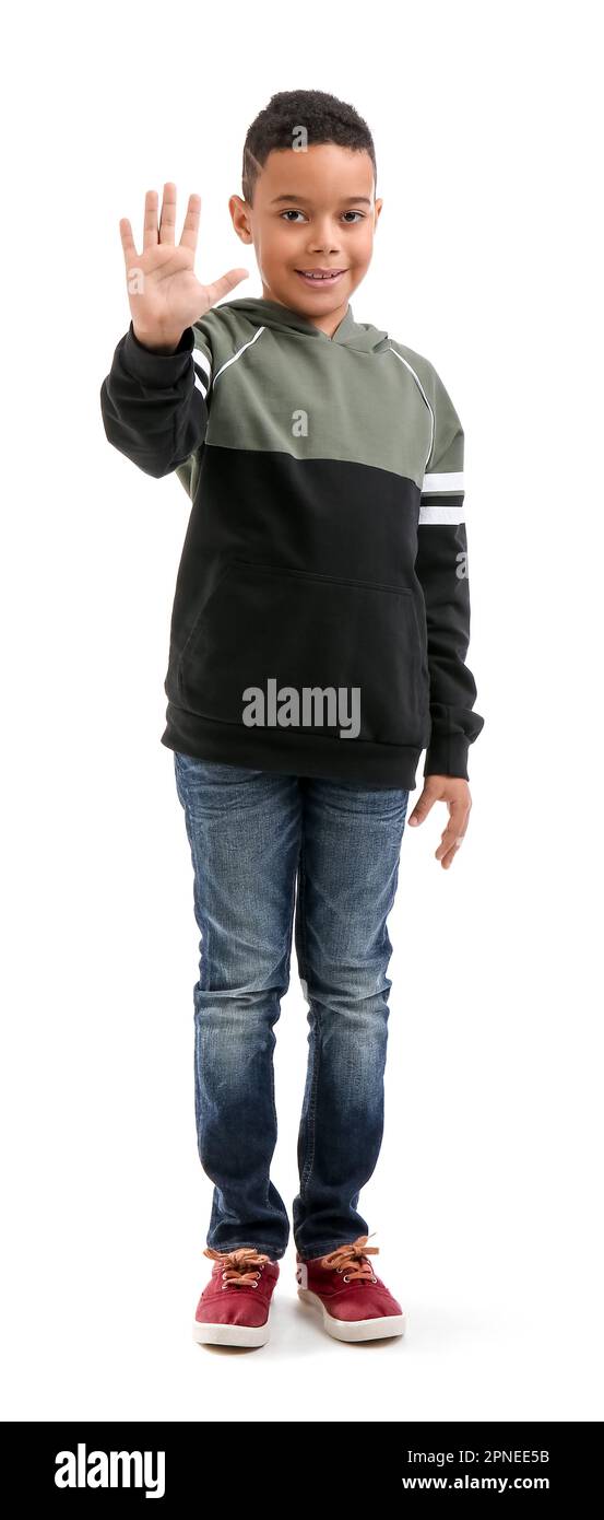 Little African-American boy waving hand on white background Stock Photo ...