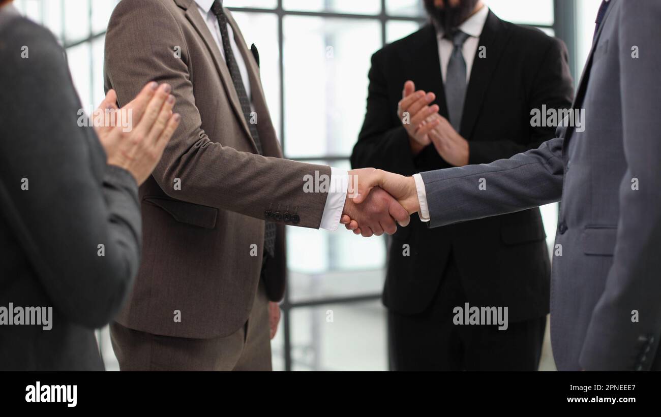 Business people, handshake or greeting in hotel lobby, modern office or ...