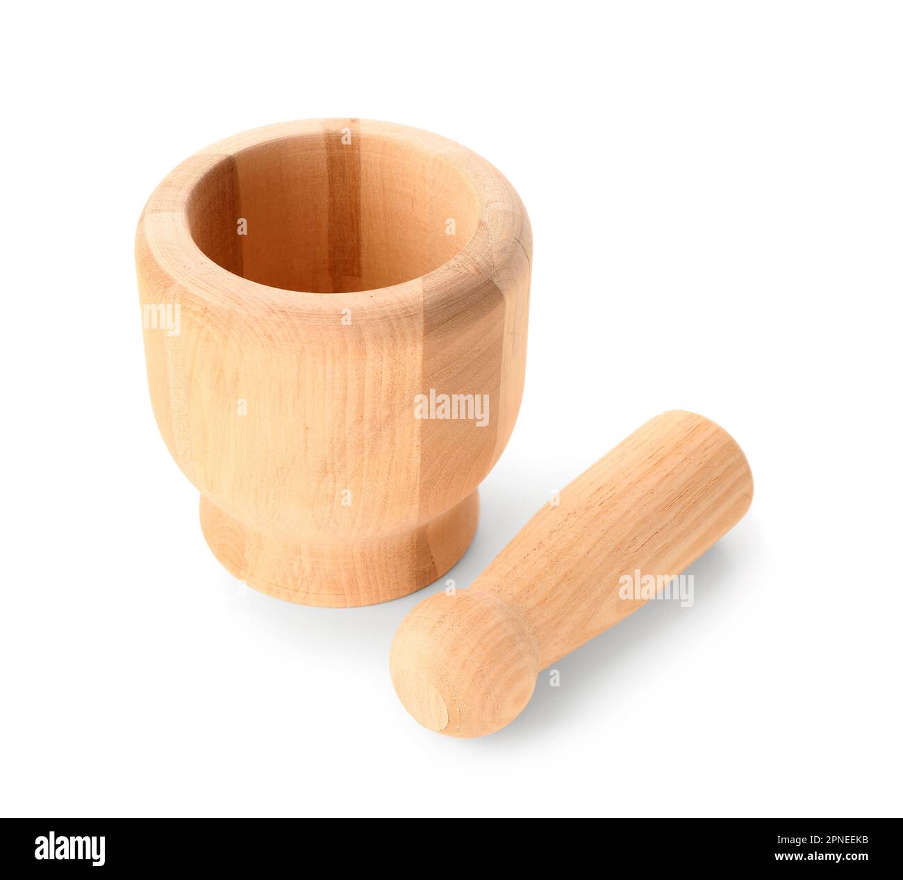 Wooden mortar with pestle isolated on white background Stock Photo - Alamy