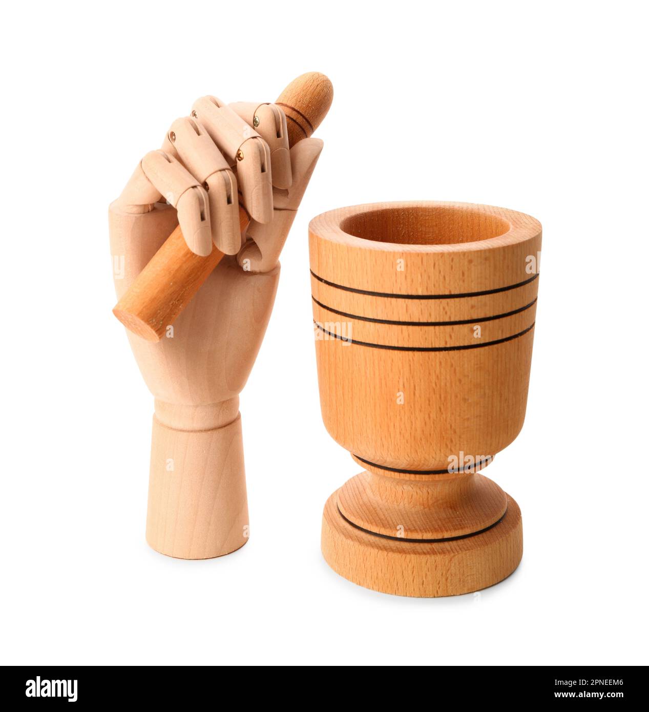 Wooden hand with mortar and pestle on white background Stock Photo - Alamy