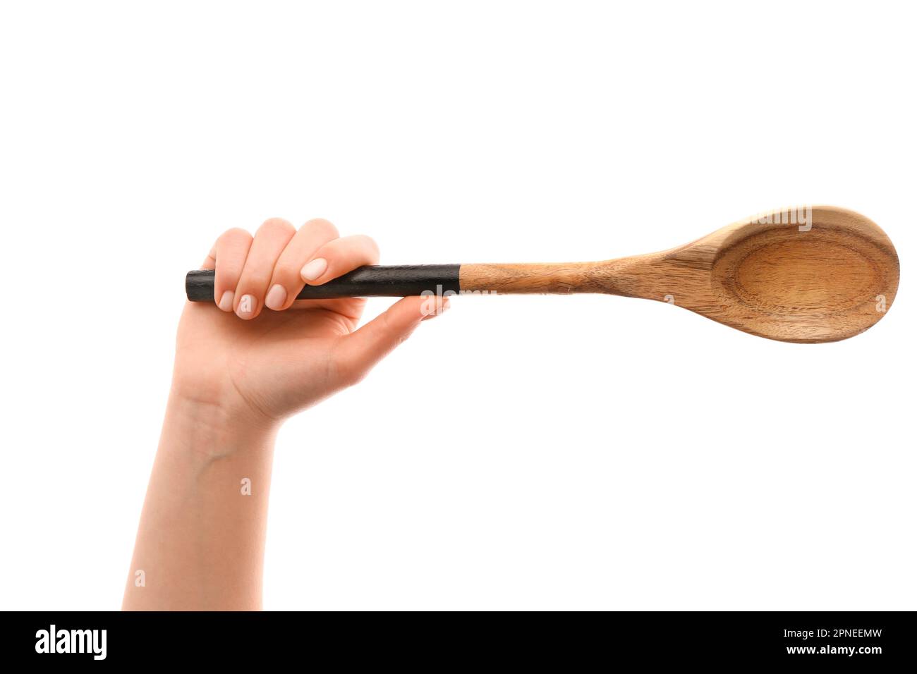 Female hand with wooden spoon isolated on white background Stock Photo ...