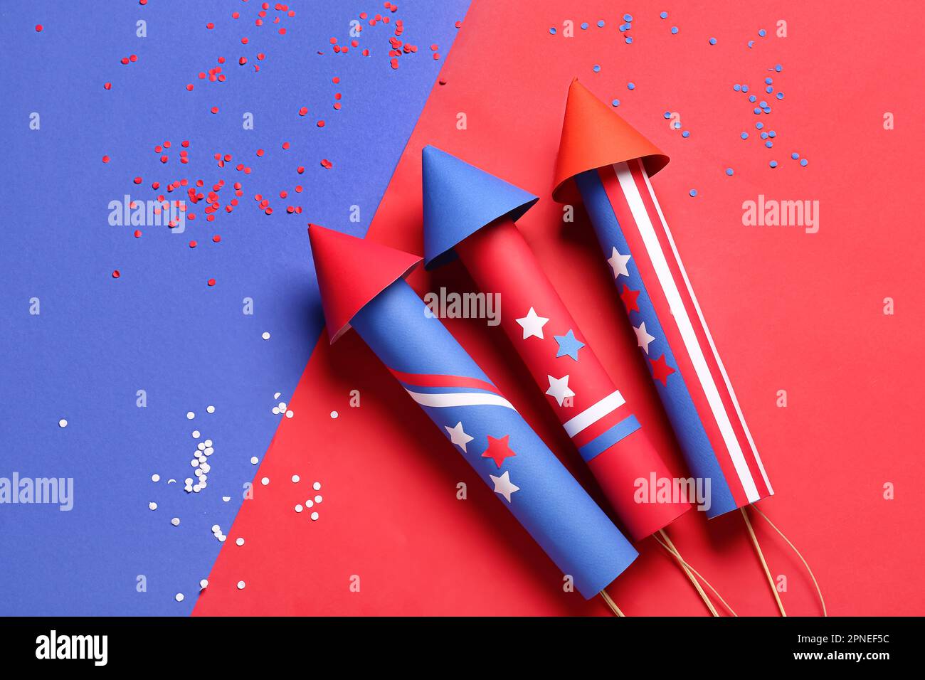 Firework rockets and confetti for Independence Day on colorful ...