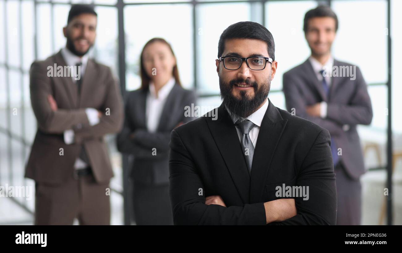 positive employee posing for company business catalogue with colleagues ...