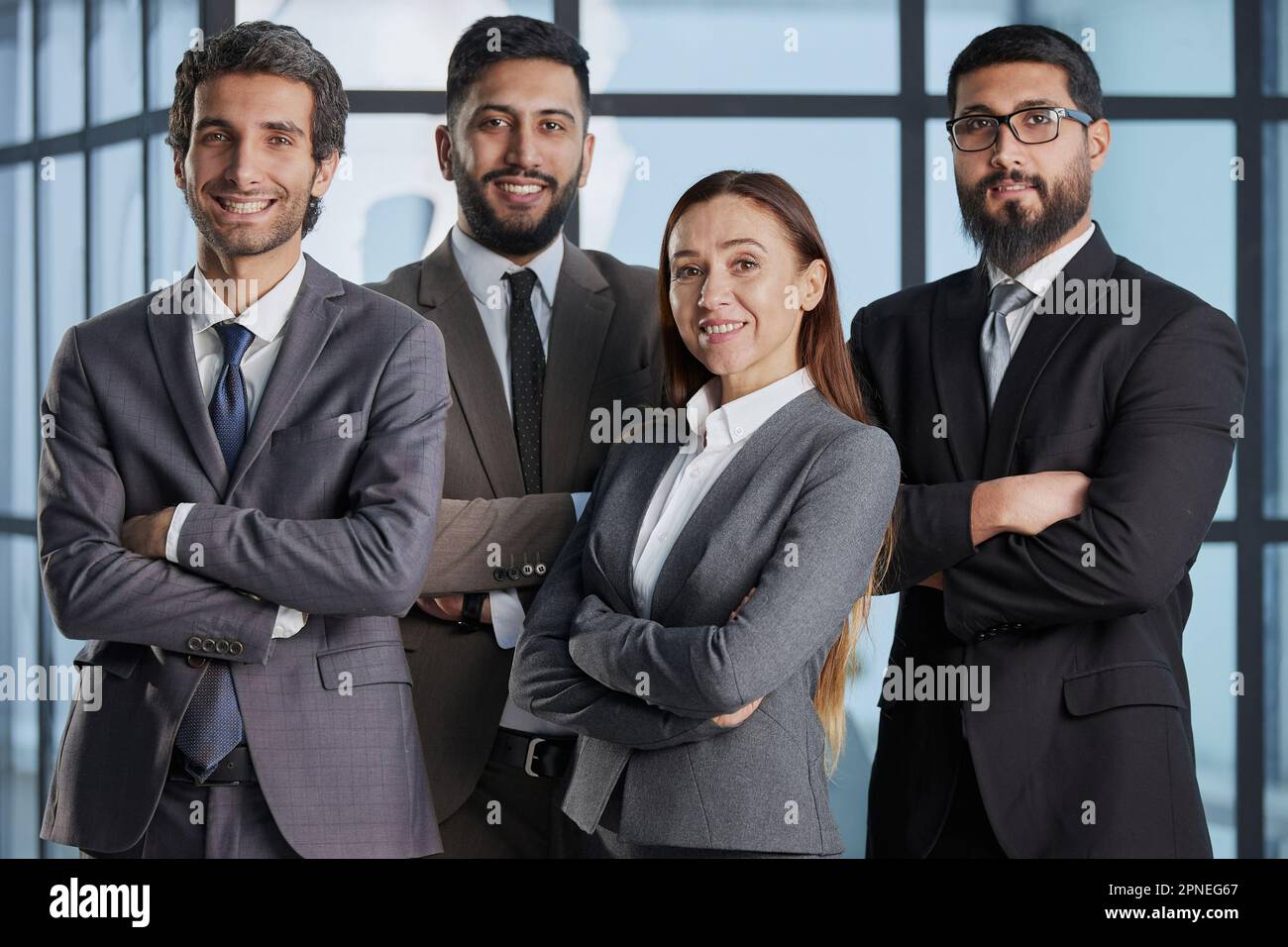 a group of different business people in an office lobby Stock Photo - Alamy