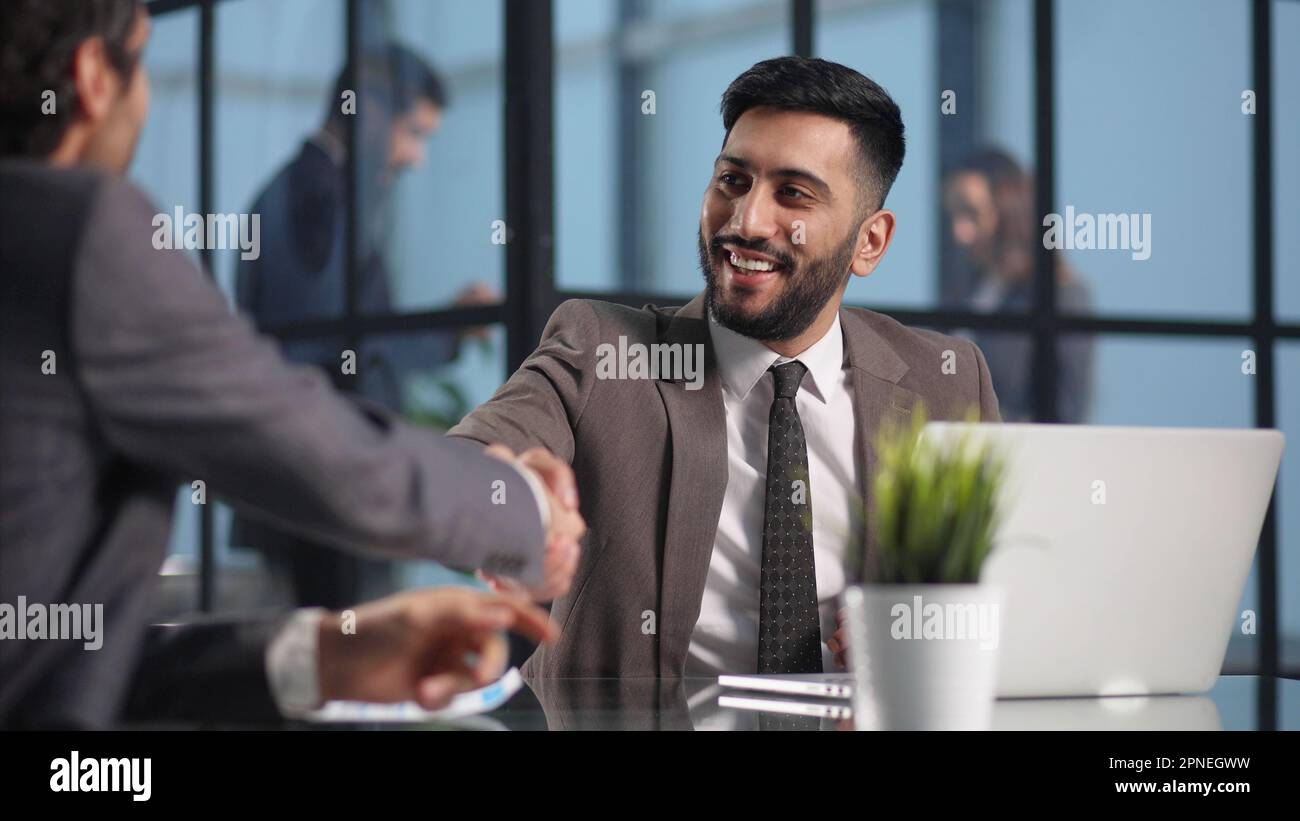 Business meeting table handshake hi-res stock photography and images ...