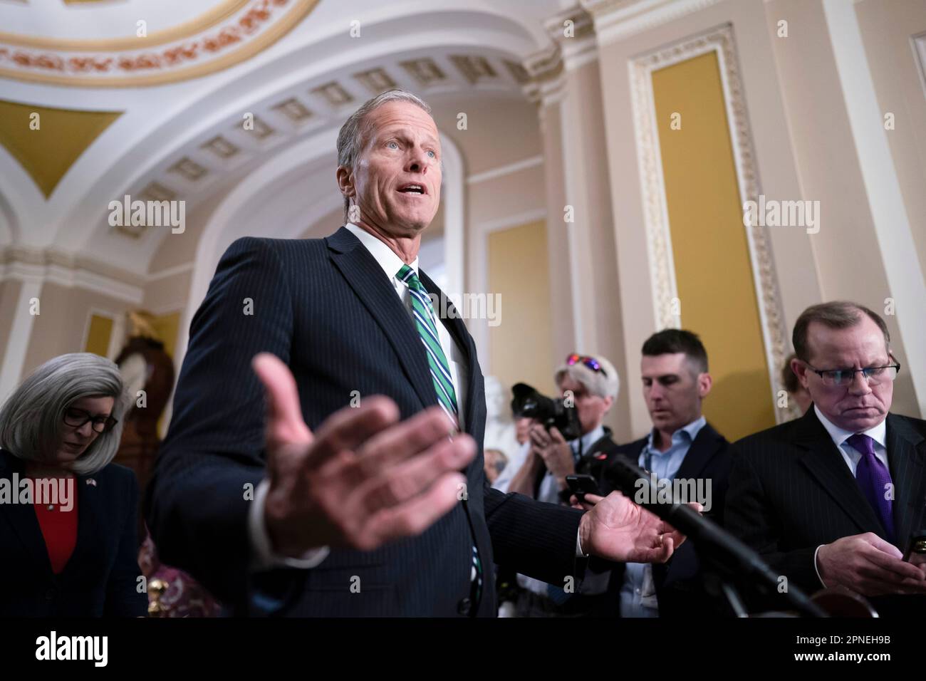 Senate Minority Whip John Thune, R-S.D., talks to reporters following a ...
