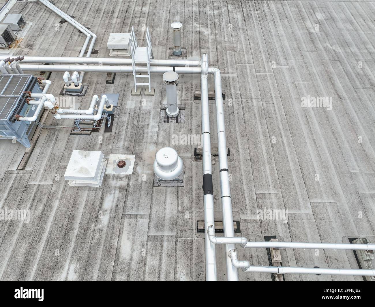 Aerial view of an Industrial looking HVAC equipment and pipes on gray ...