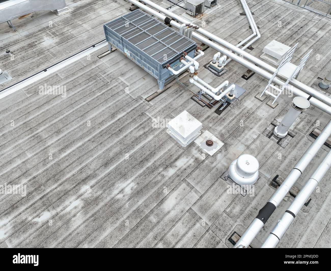 Aerial view of an Industrial looking HVAC equipment and pipes on gray ...