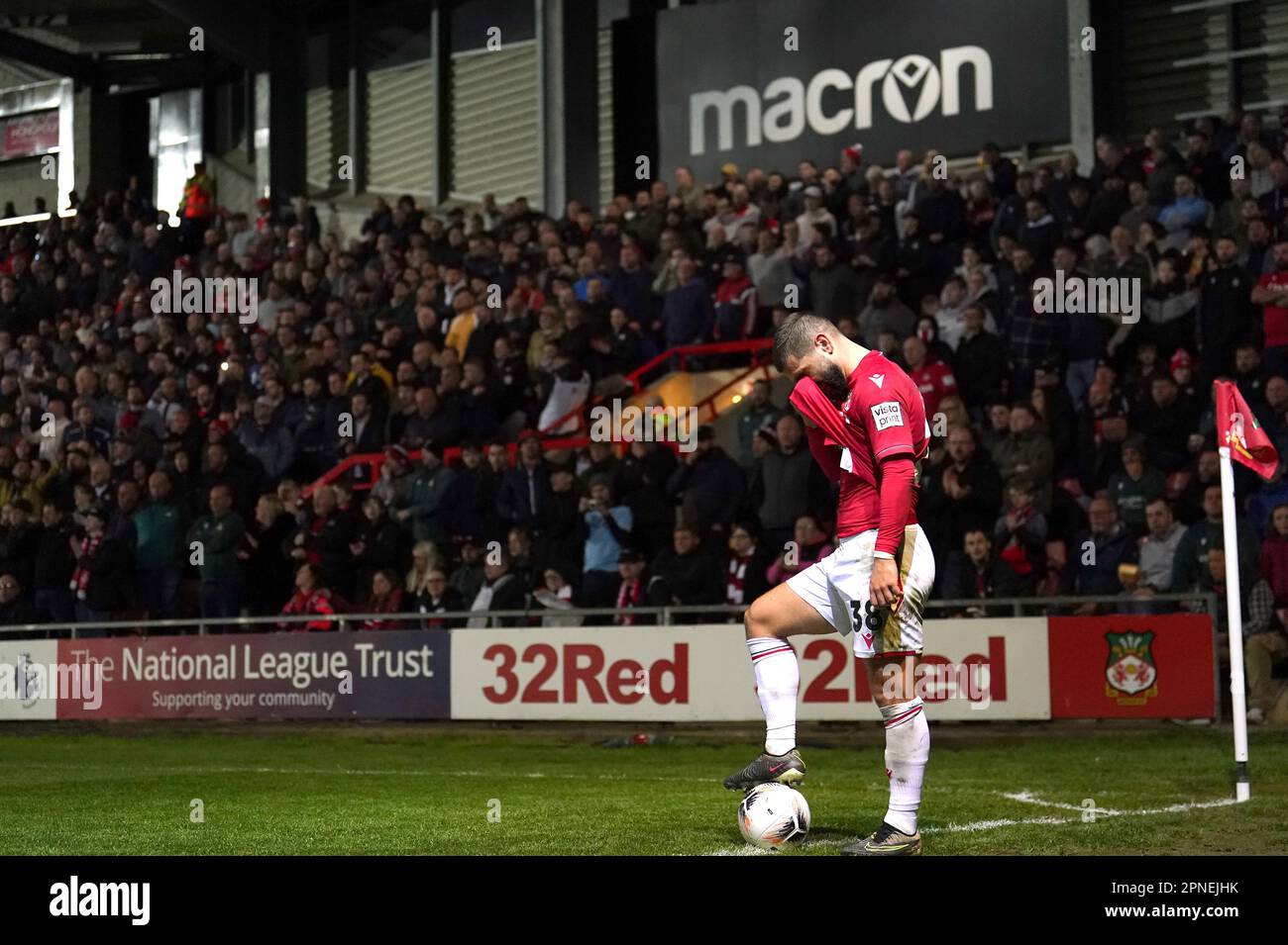 General view of the Wrexham fans as Wrexham's Elliot Lee takes a corner ...
