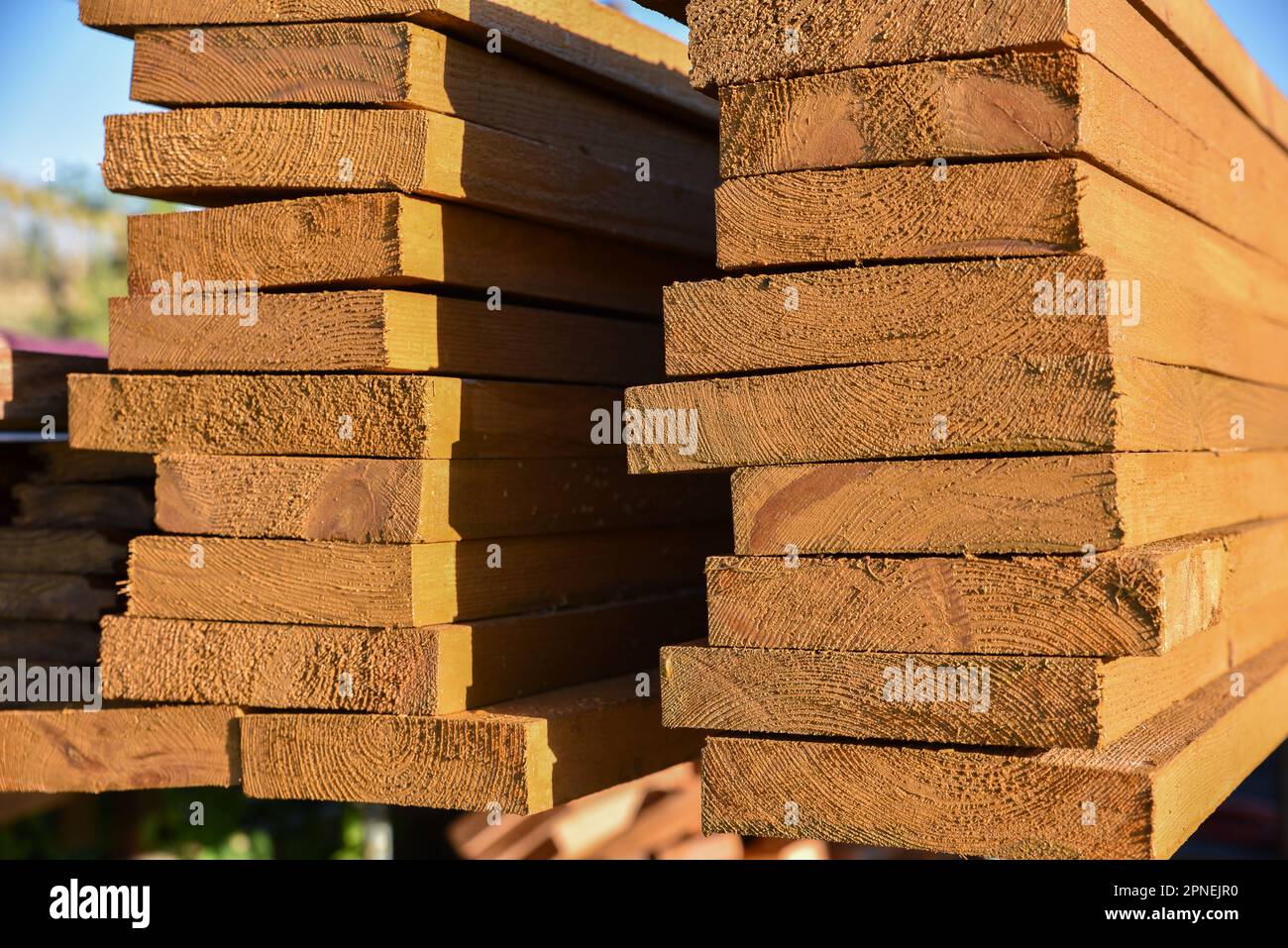 Selection of timber material - planks freshly sawn Stock Photo - Alamy