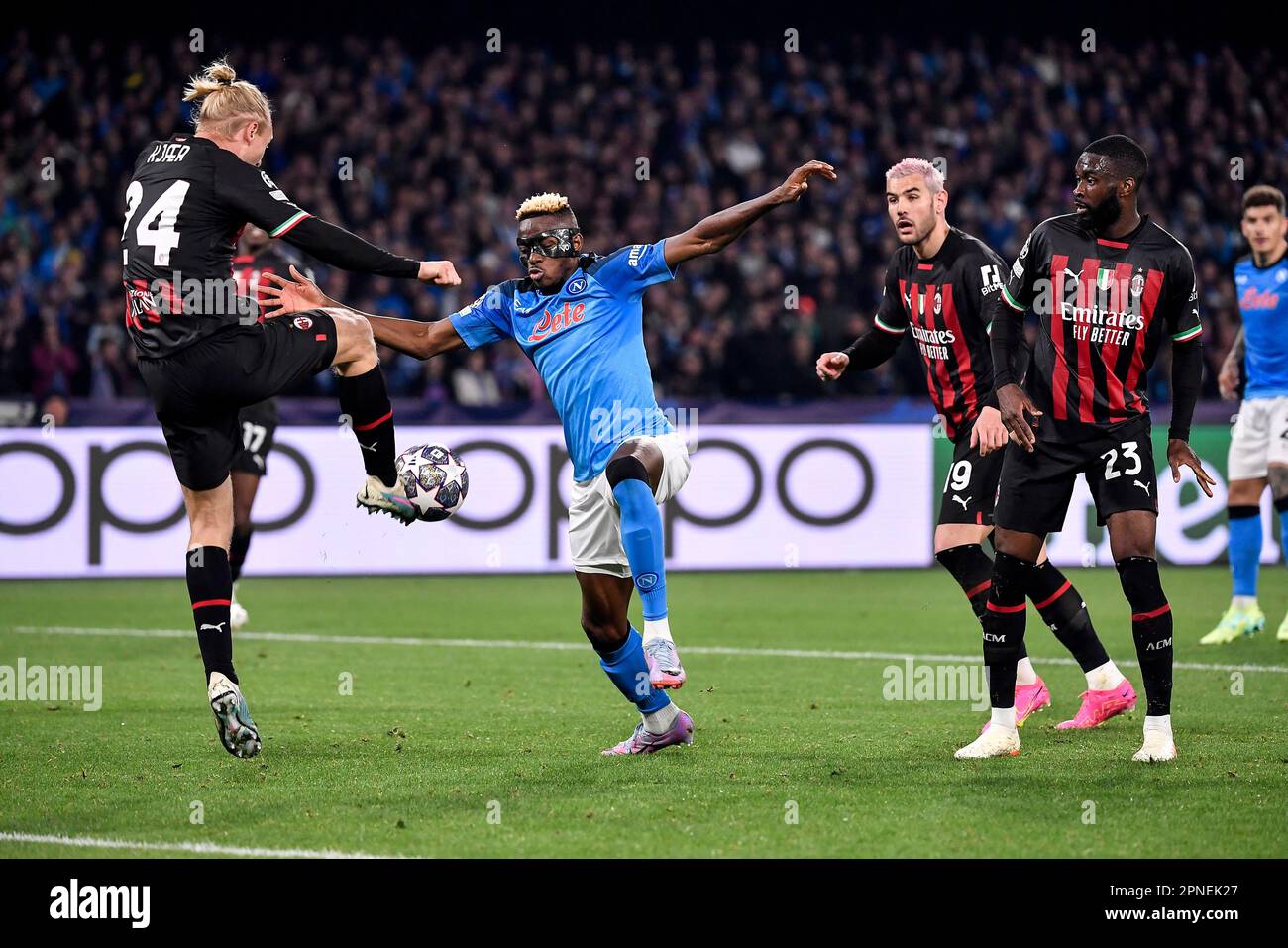 Naples, Italy. 18th Apr, 2023. Simon Kjær of AC Milan, Victor Osimhen ...