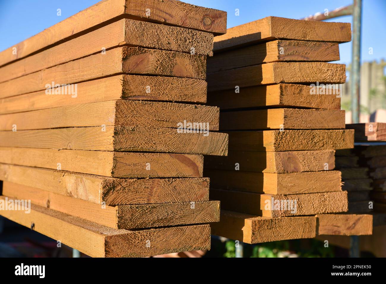 Selection of timber material - planks freshly sawn Stock Photo - Alamy