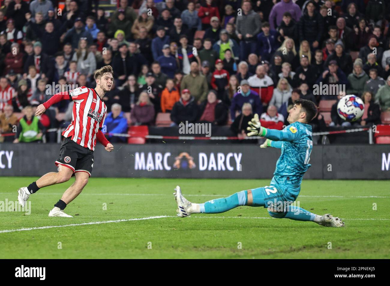 James McAtee #28 of Sheffield United scores to make it 1-0 during the ...