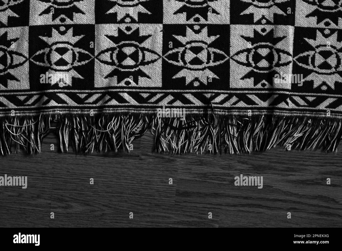 A beautiful carpet on the floor. Black and white photo Stock Photo - Alamy
