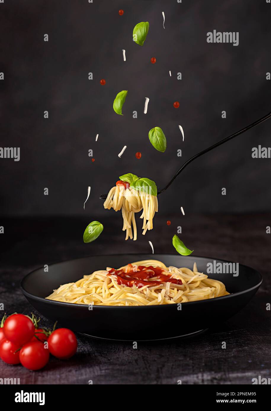 Food photography of spaghetti with tomato sauce, basil, cheese ...