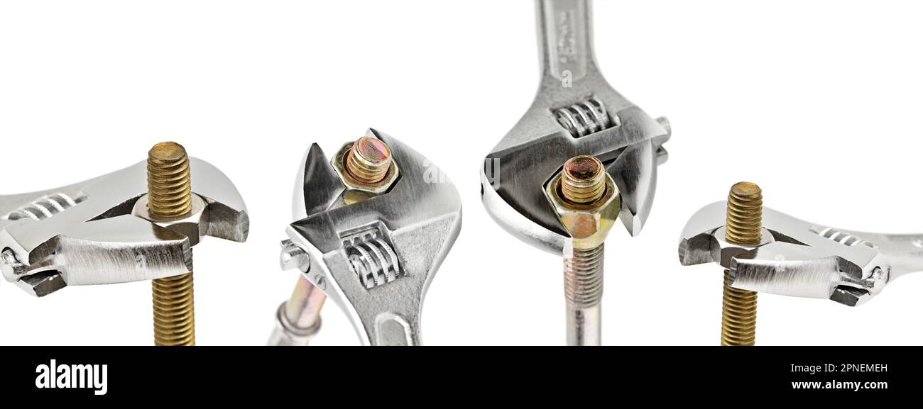 Set wrenches with bolts and nuts photographed from various angles ...