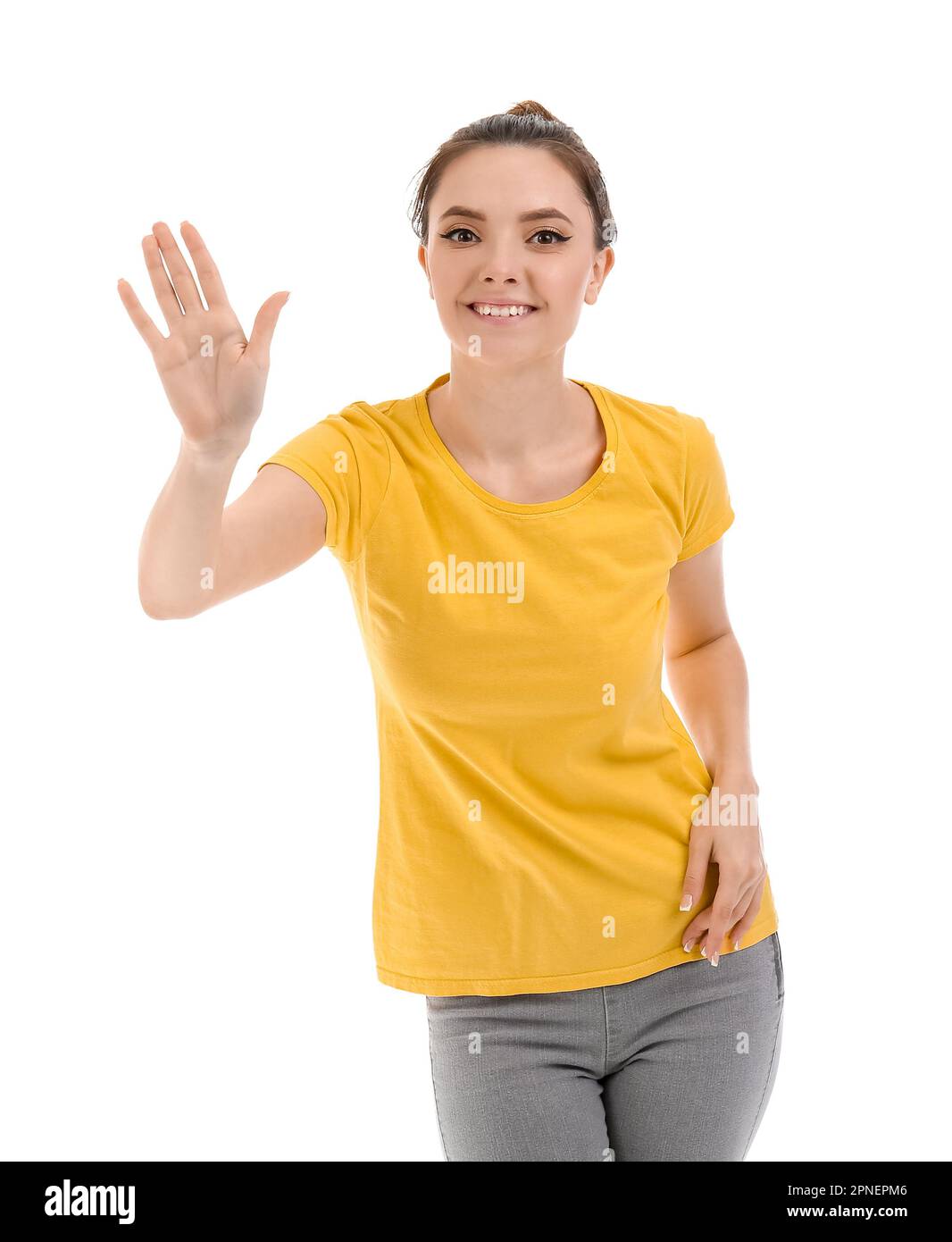 Beautiful young woman waving hand on white background Stock Photo - Alamy
