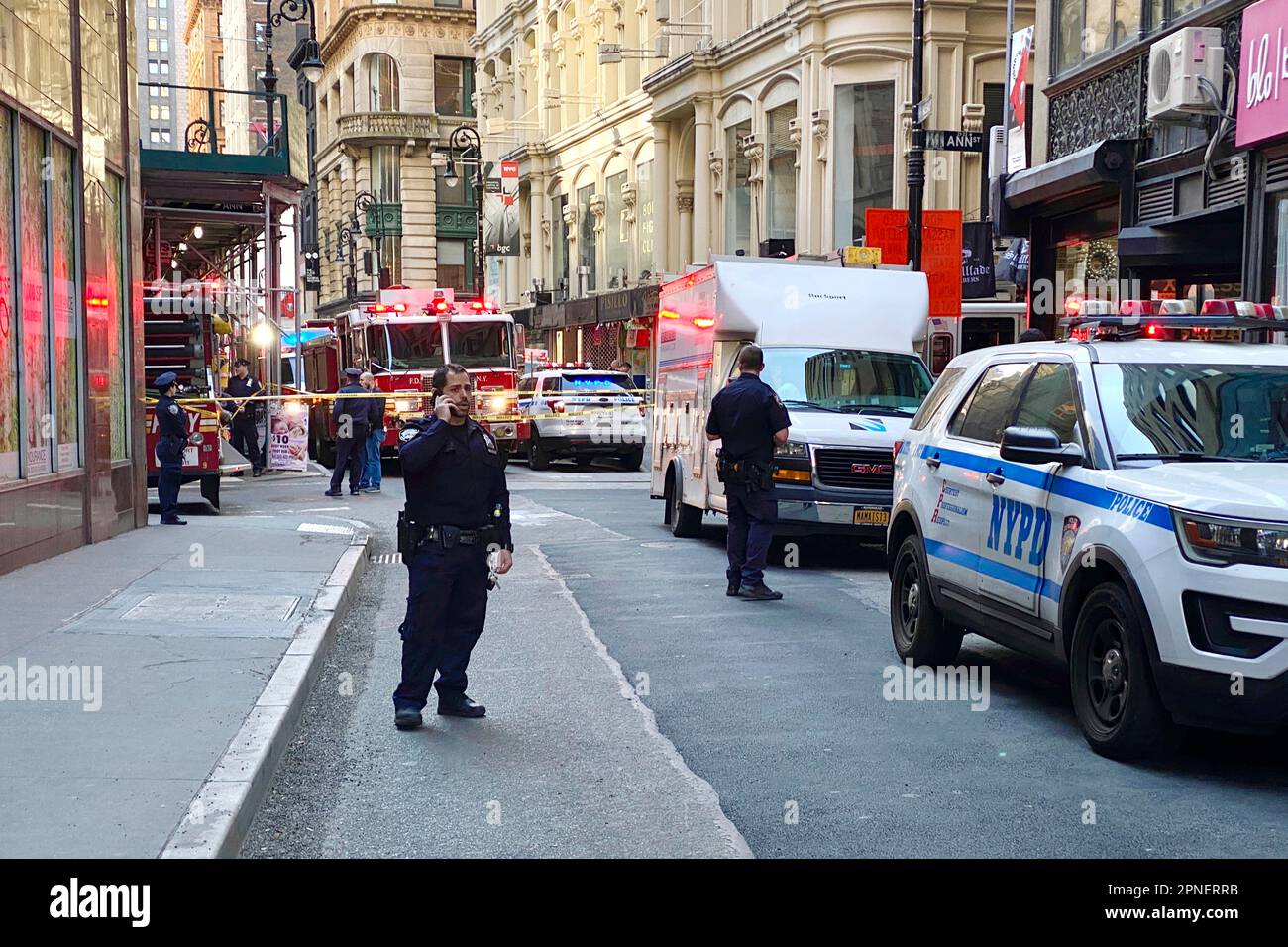 New York City Police and Fire Department personnel cordon off an area ...