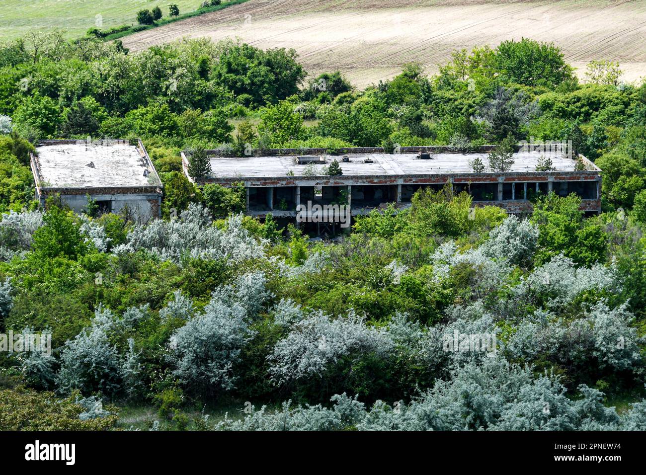 Ruins of an old Cold War military barracks from above in Hungary Stock ...