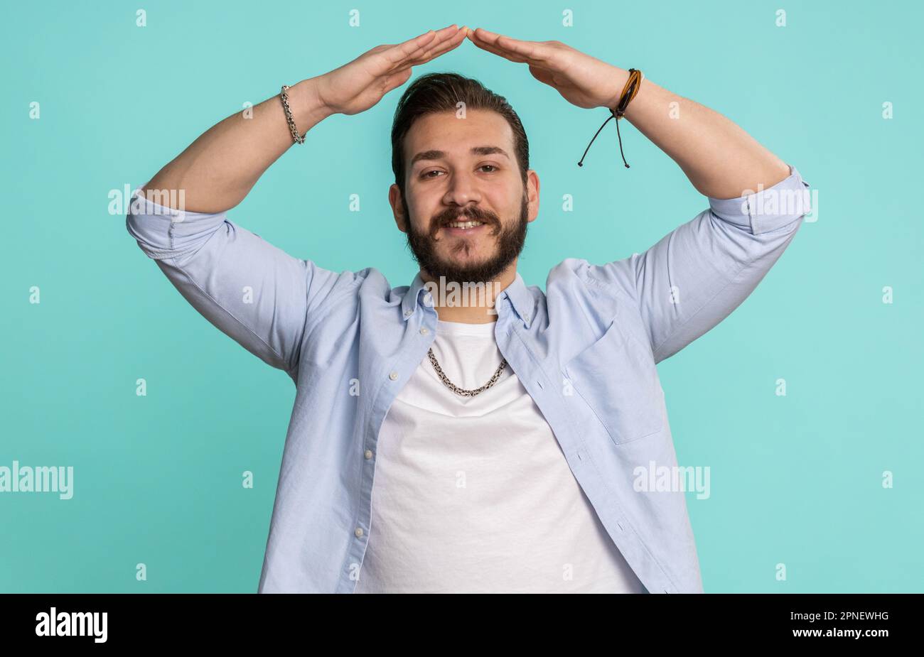 Young lebanese man playing childish catching up game, feeling in safe ...
