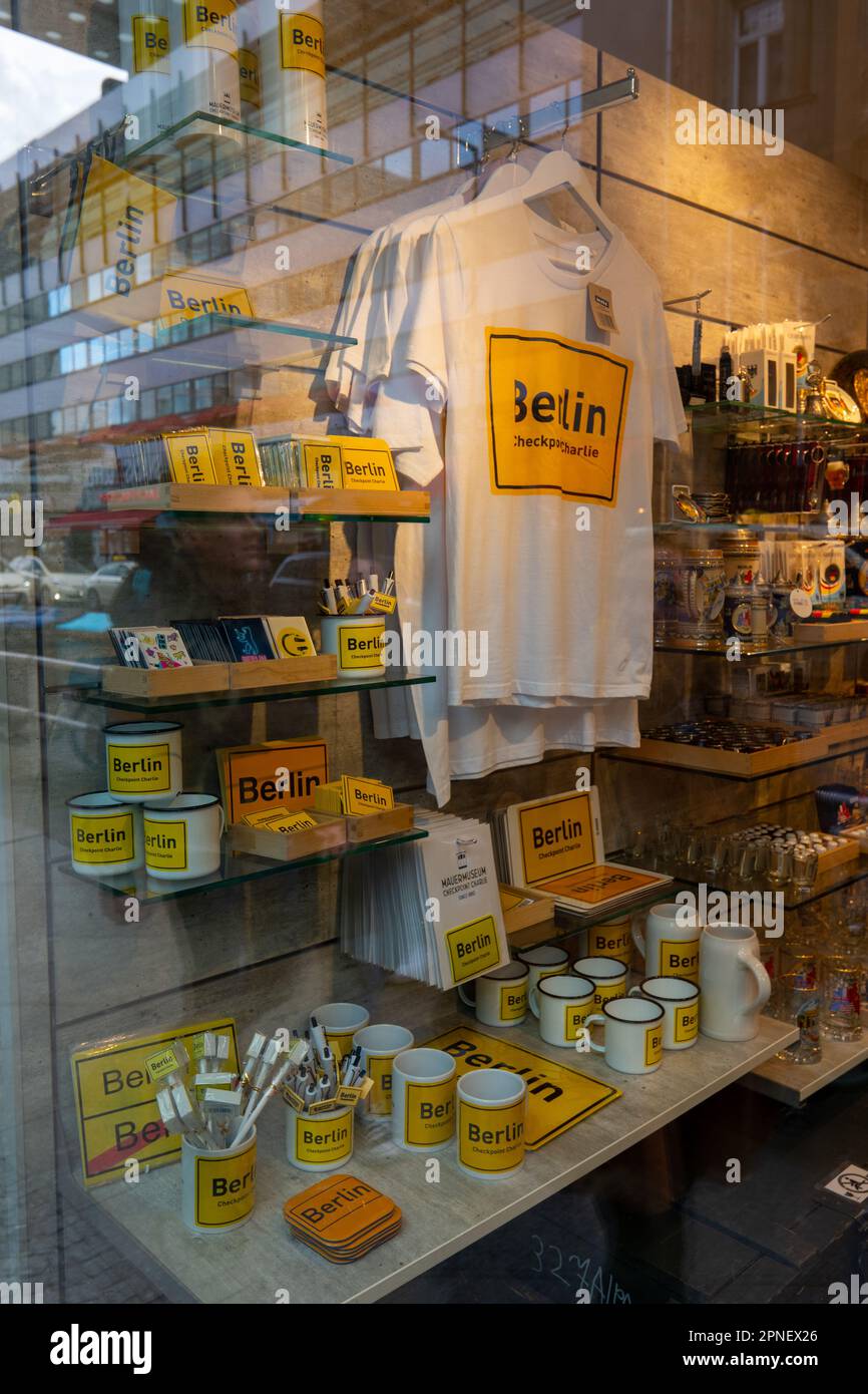 Tourist shop window near Checkpoint Charlie the best-known Berlin Wall ...