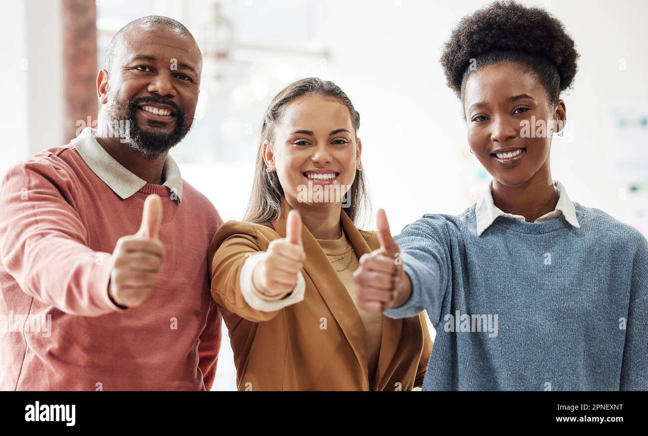 Business people, thumbs up and team portrait in office with support, motivation or diversity at ...