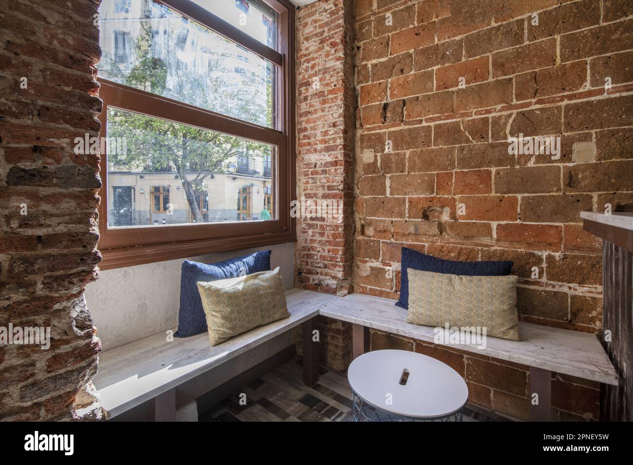 Cozy corner of a bar by the window Stock Photo - Alamy