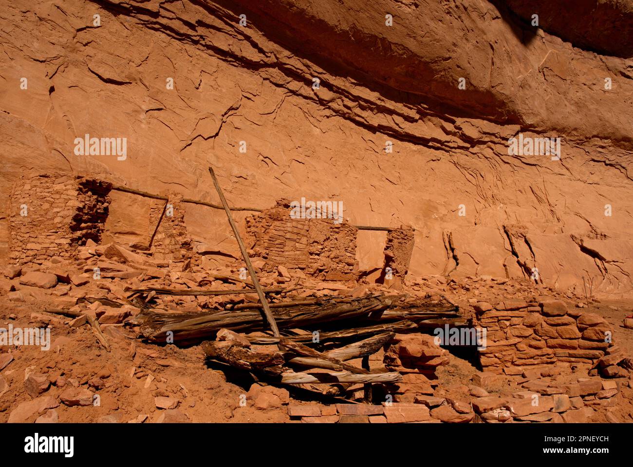 Remnants of an ancient structure with petroglyphs behind it in Utah's ...