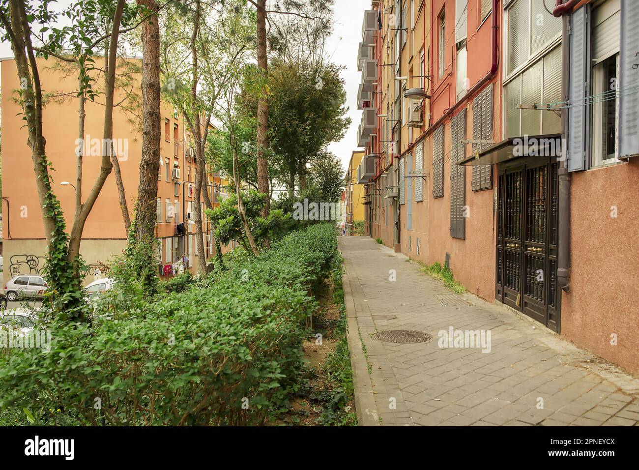 Urban sidewalk that passes in front of the access portals to ...