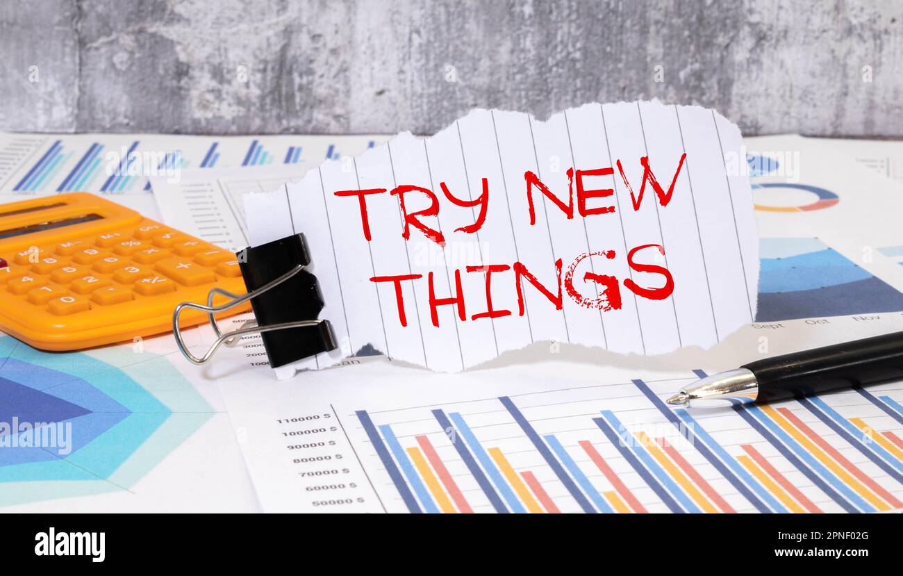 Try New Things write on Sticky Notes Stock Photo - Alamy