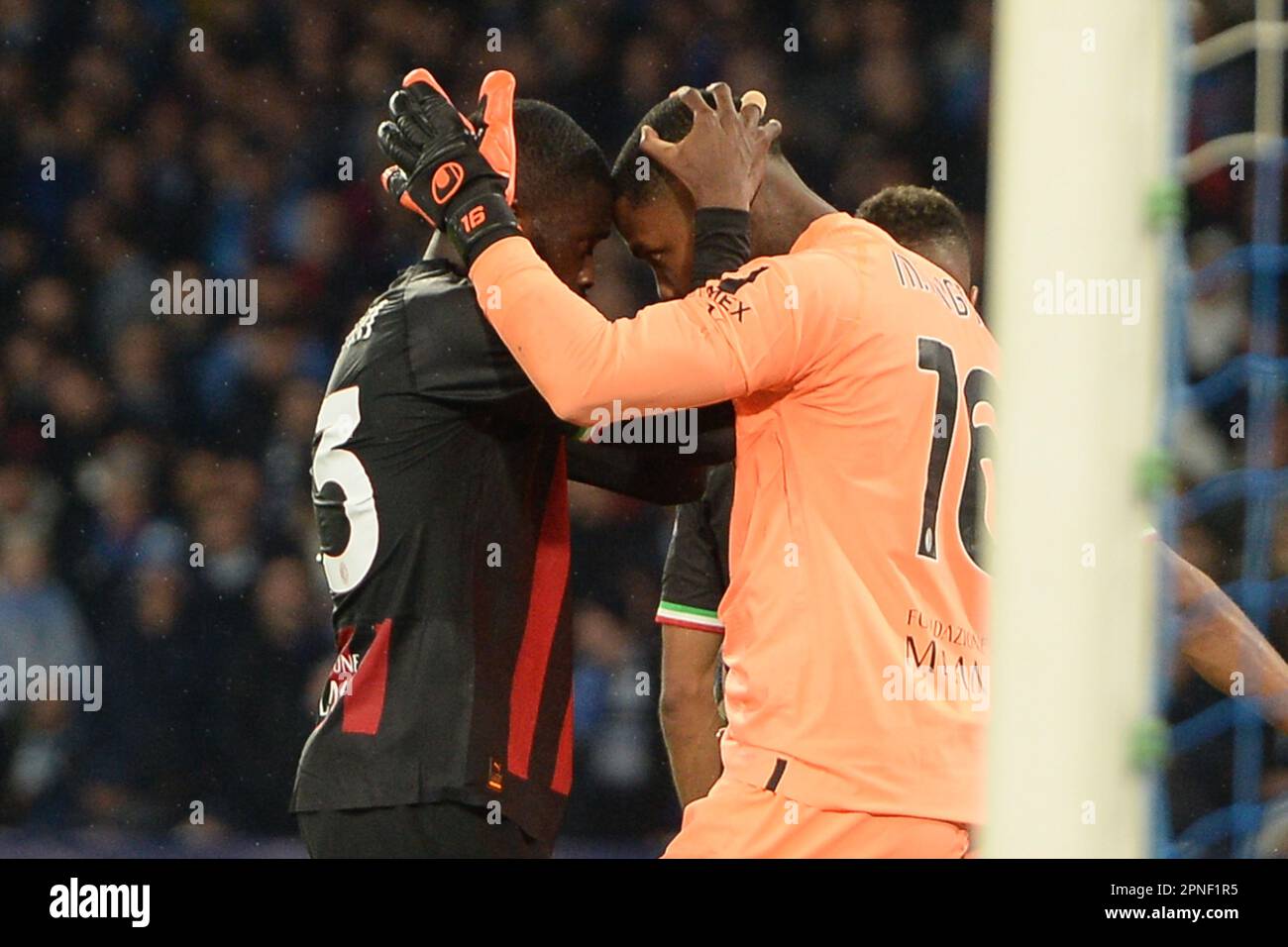 Naples, Italy. 18th Apr, 2023. Fikayo Tomori of AC Milan embrace Mike ...