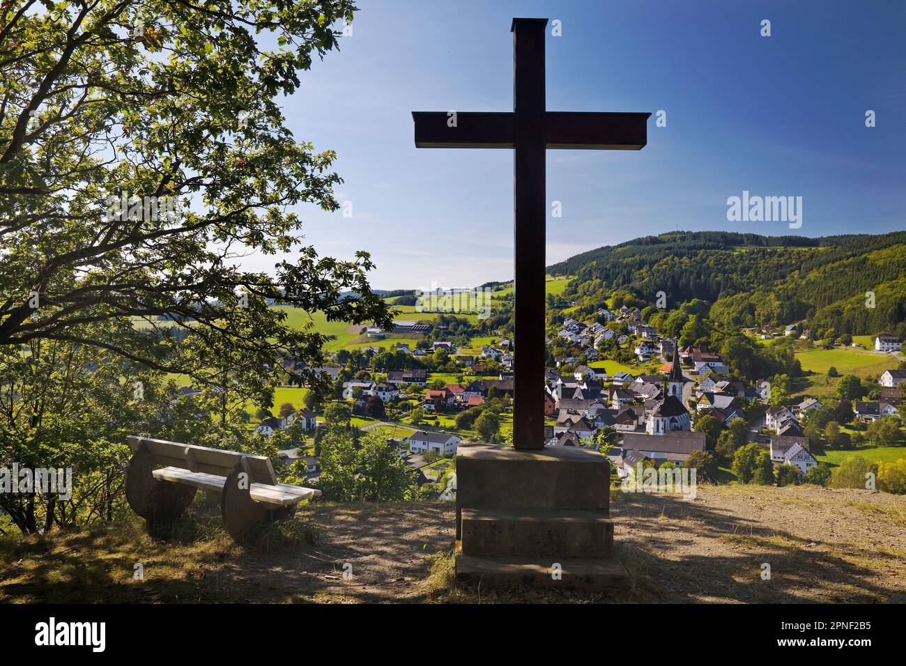 cross of the Kreuzberg Chapel with a view of the Duedinghausen district ...