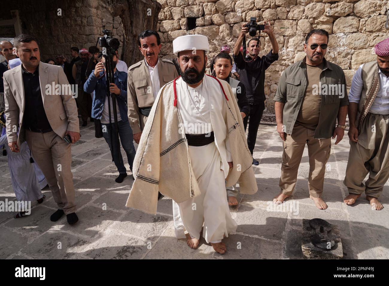 Dohuk, Iraq. 18th Apr, 2023. Baba Sheikh Ali Alyas (C), supreme ...