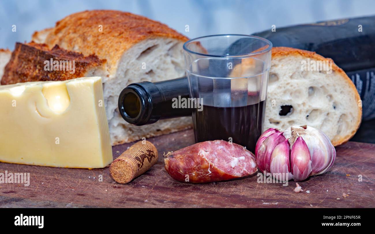 More traditional rustic Italian food, bread, salami, cheese and wine ...