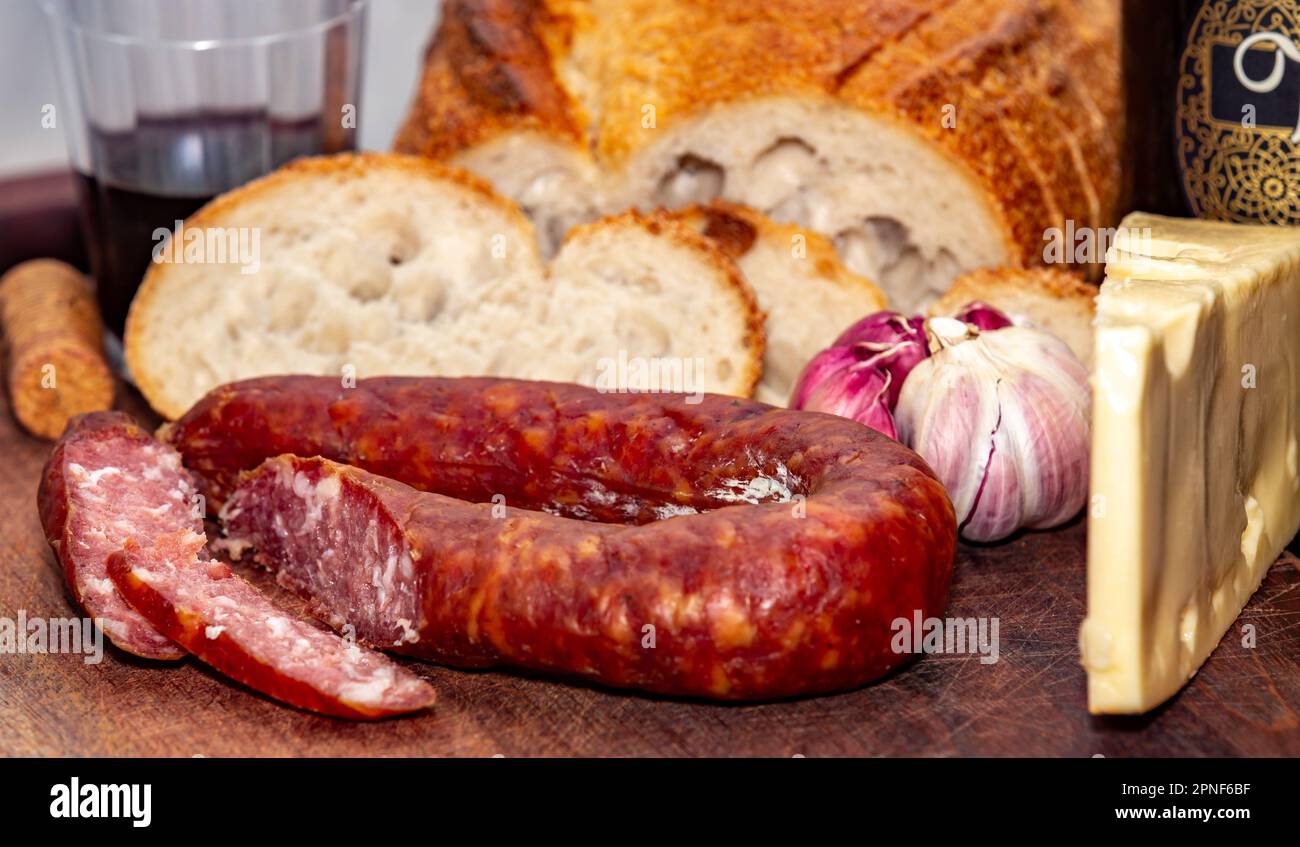 More traditional rustic Italian food, bread, salami, cheese and wine ...