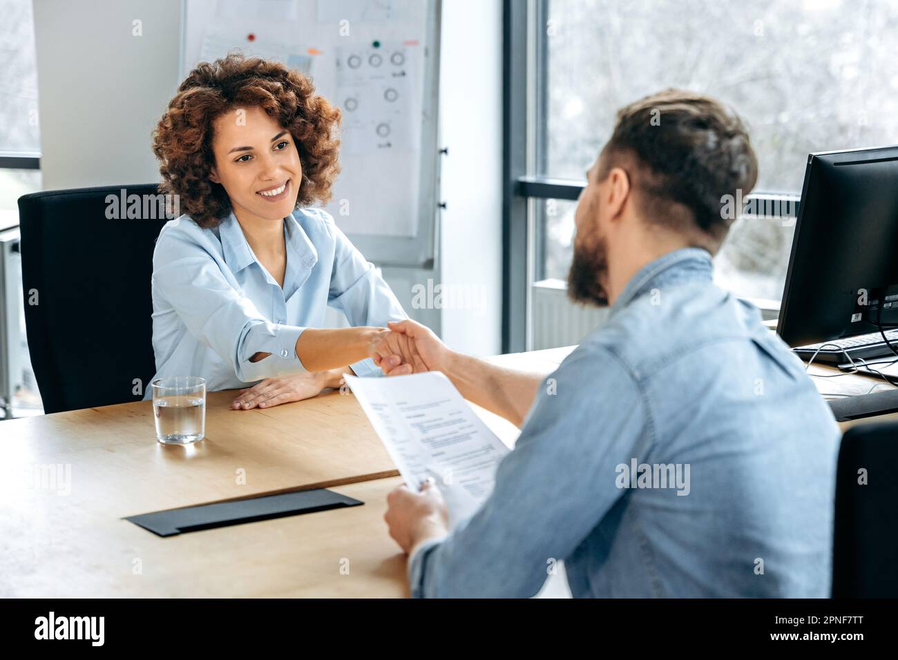 Cooperation concept. Man and woman, business people, successfully ...