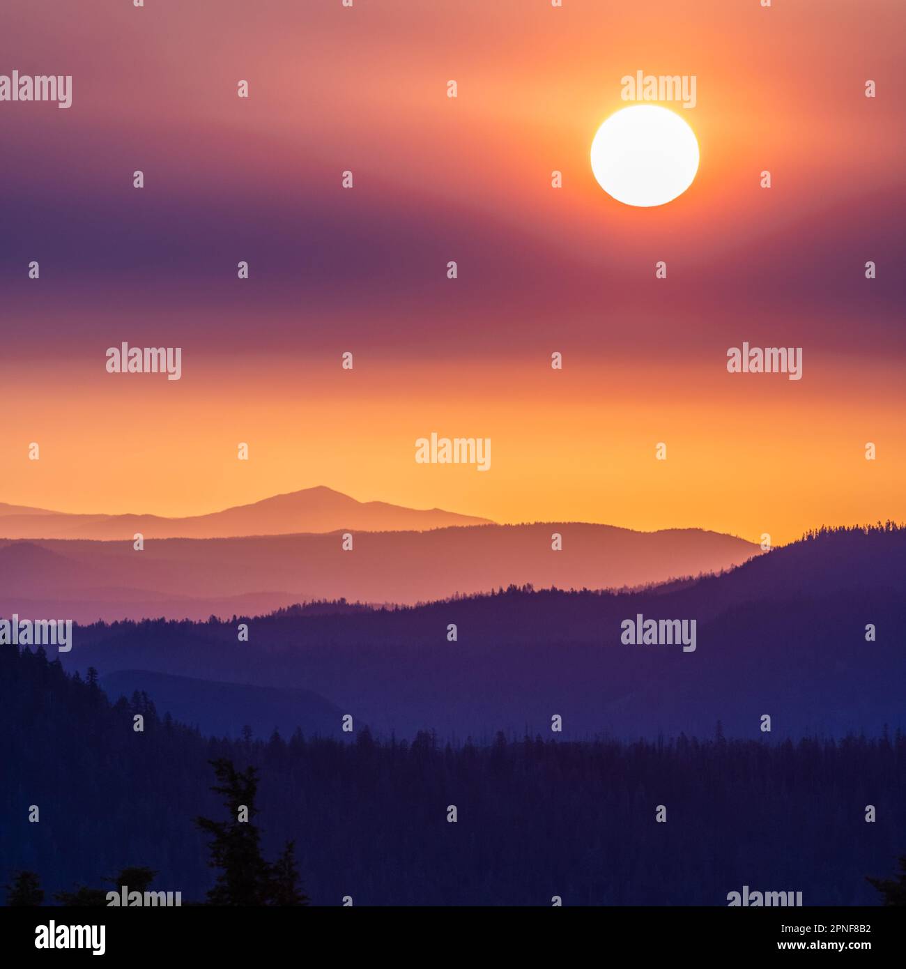 Crisp Edges of Sun Formed by Smoky Skies over layers of Lassen Volcanic ...