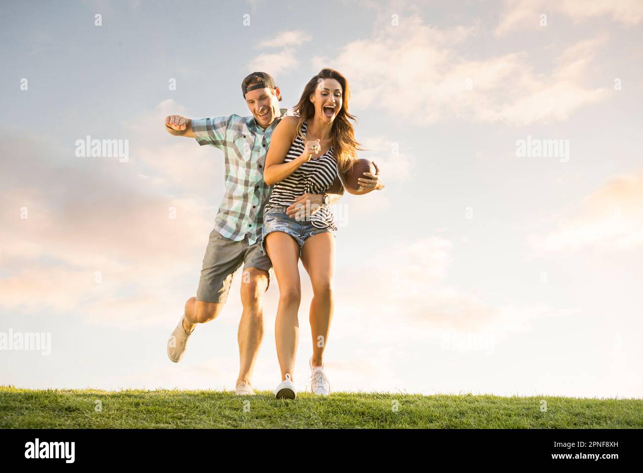 Woman playing ball hi-res stock photography and images - Alamy