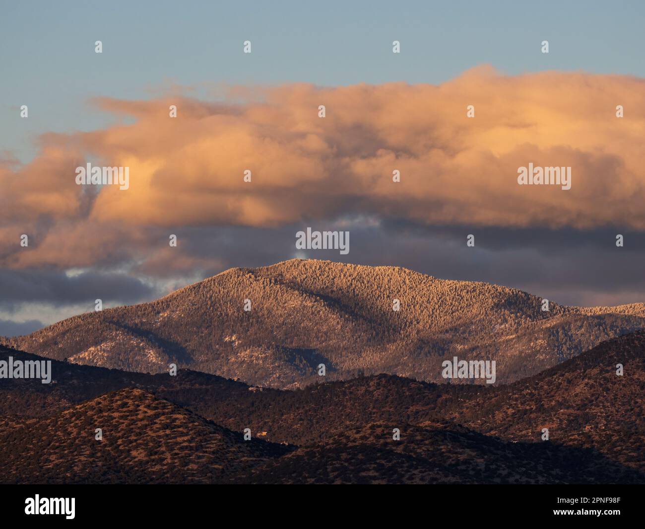 United States, New Mexico, Santa Fe, Light snow on Sangre se Cristo ...