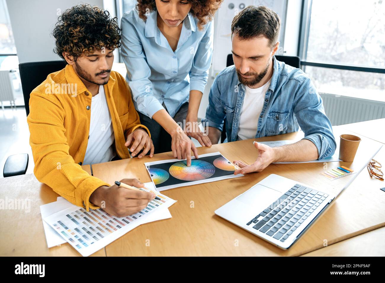 Working on a design project, pantone selection. Teamwork concept ...