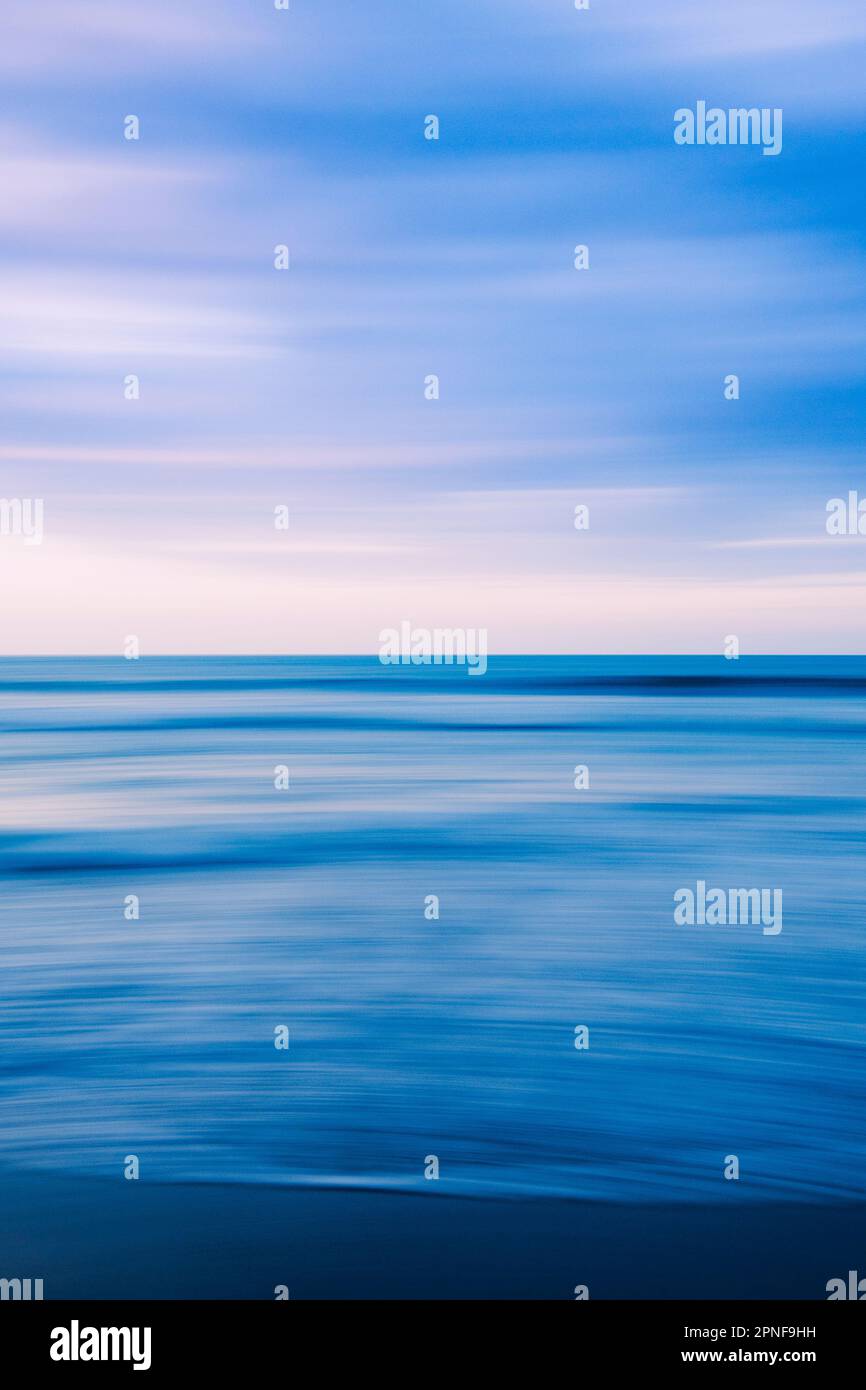 Smooth blue surface of sea Stock Photo - Alamy