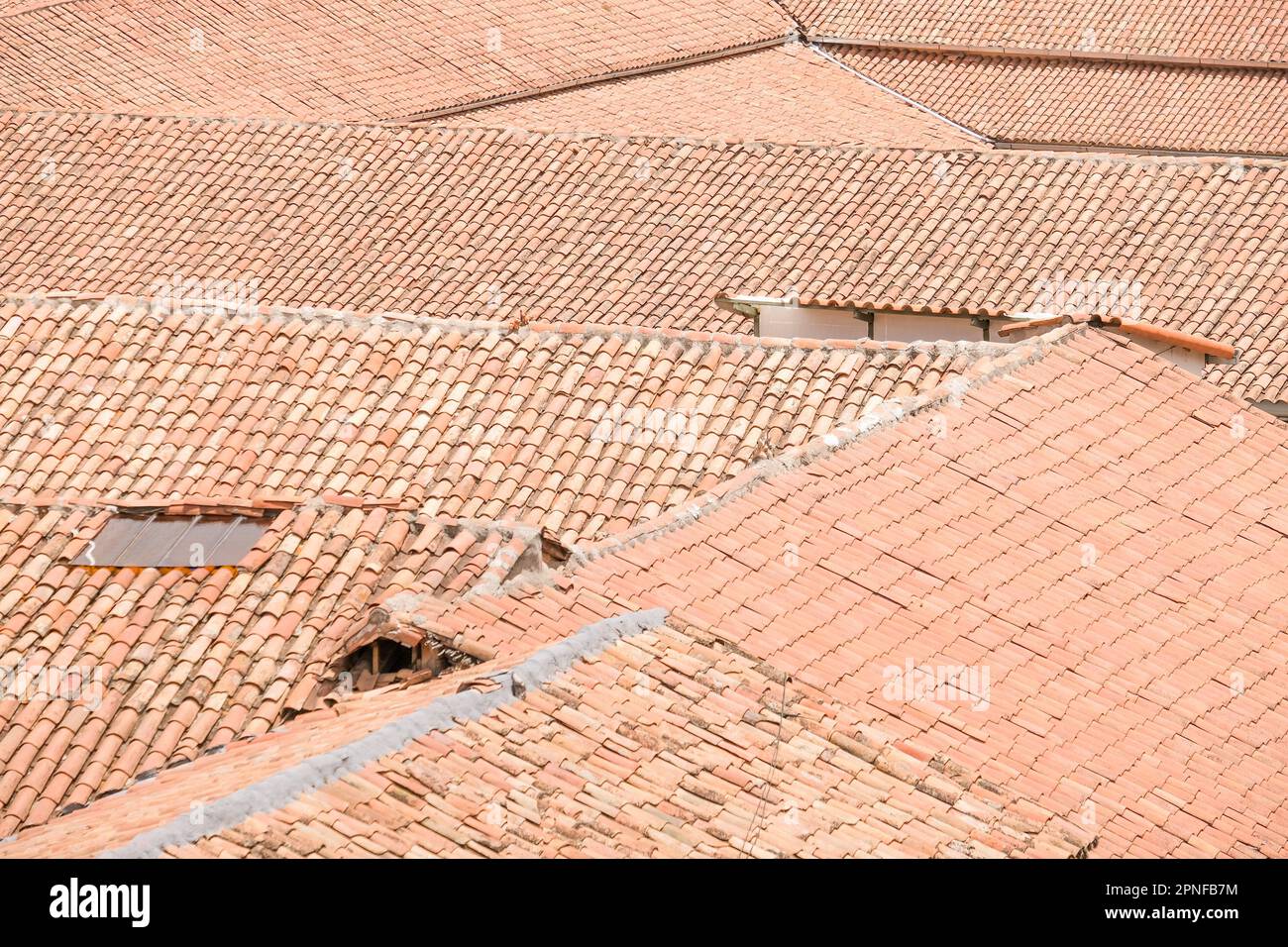 Top view of roofs. Roof tile red background wallpaper. Selective focus ...