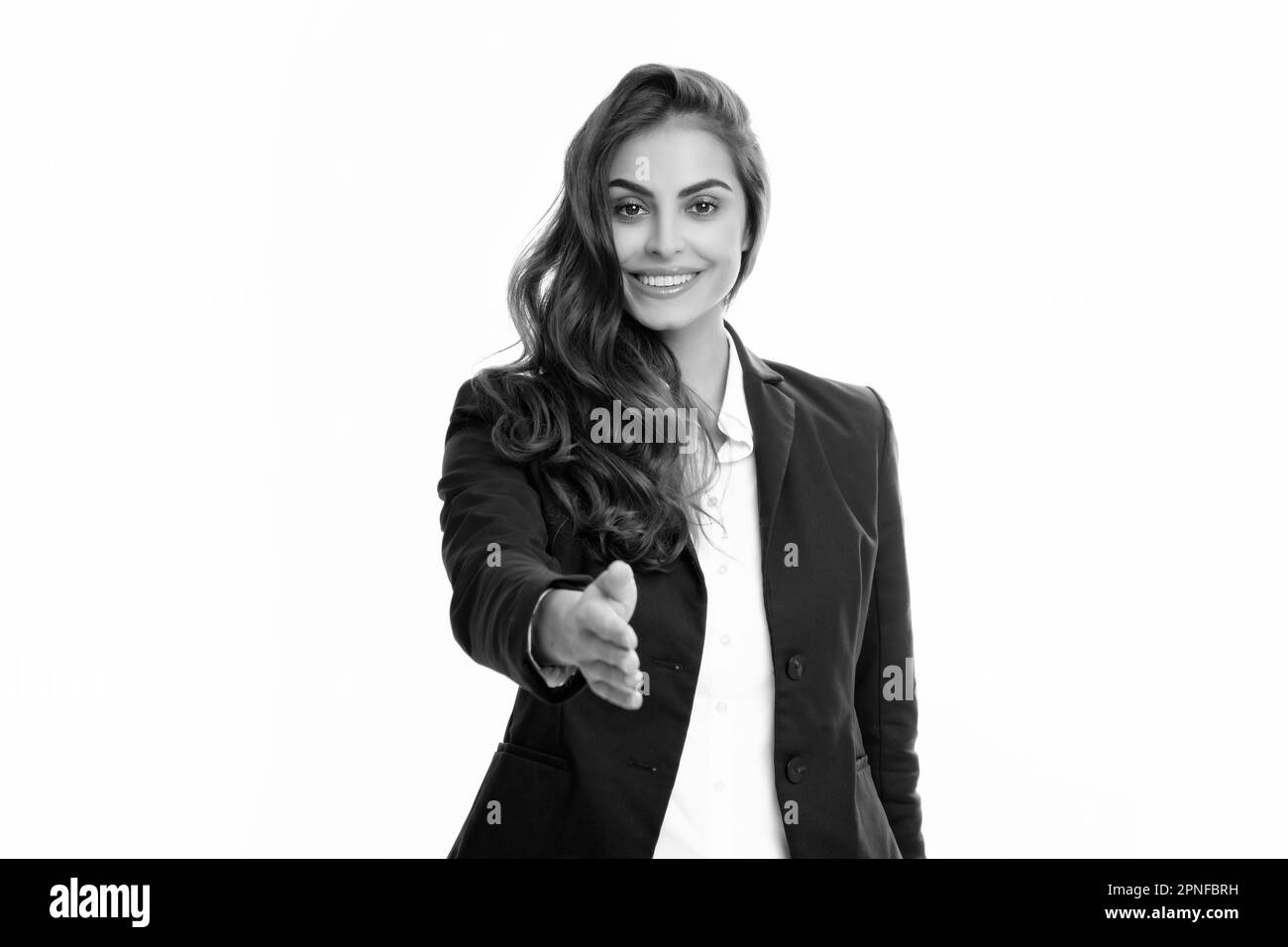 Business woman in suit smiling friendly offering handshake as greeting ...