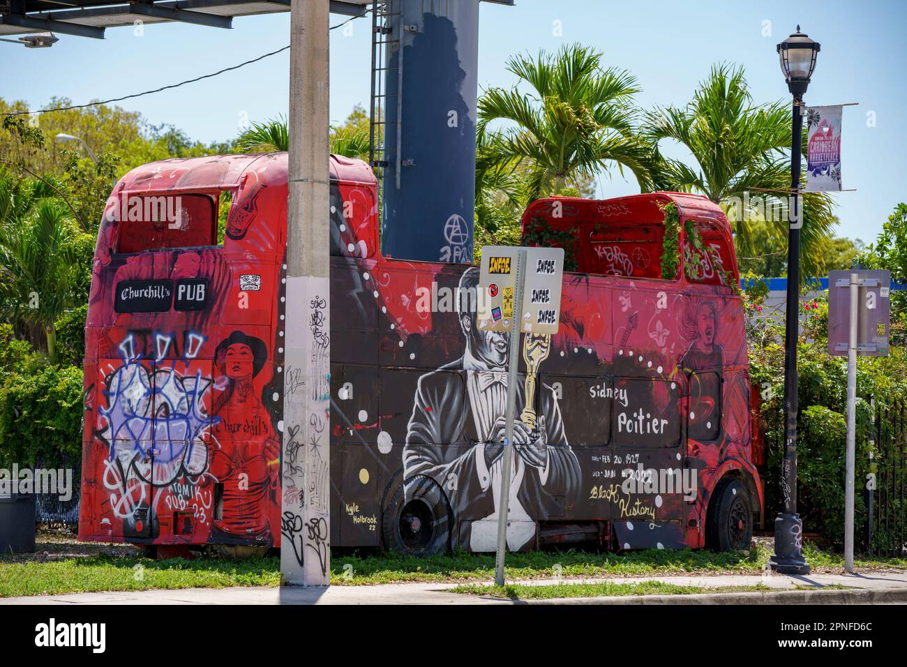 Little Haiti Miami, FL, USA - April 18, 2023: Red painted double decker ...
