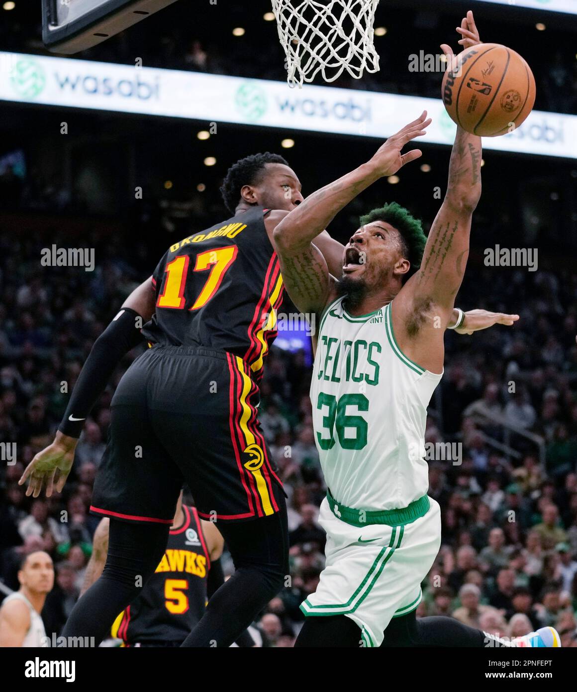 Boston Celtics guard Marcus Smart (36) is fouled by Atlanta Hawks ...