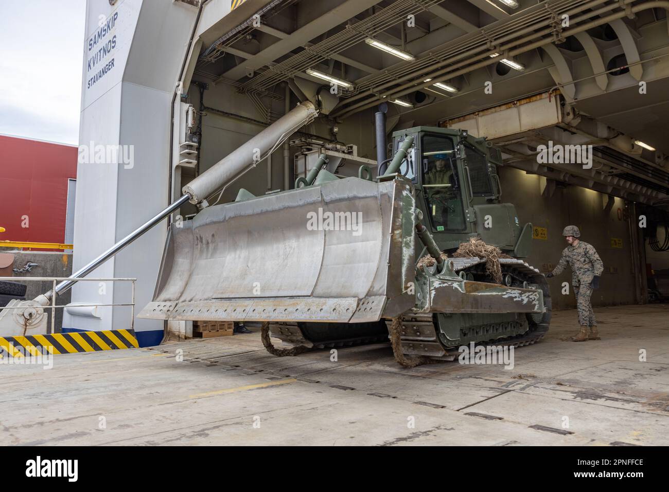 U.S. Marine Pfc. Lakelan Dawes, an engineer equipment operator with ...
