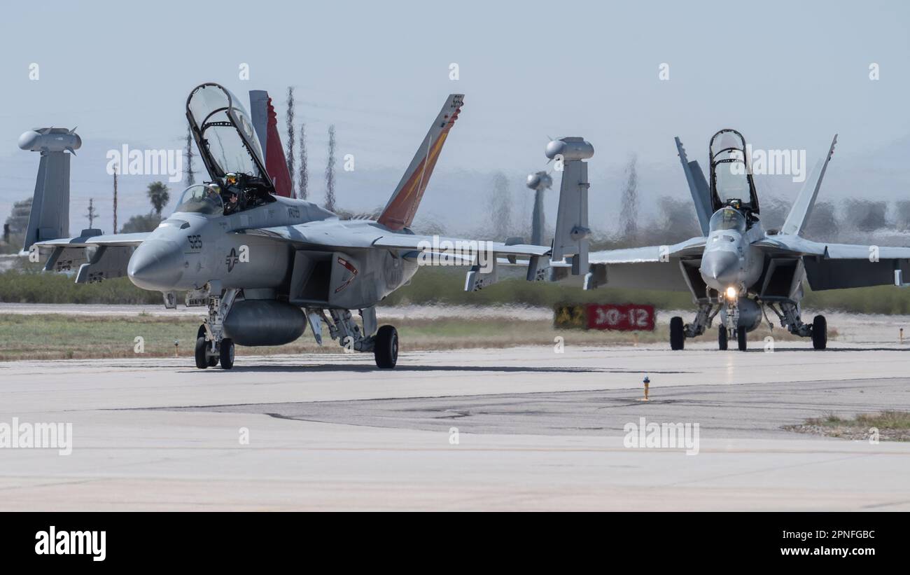 Two U.S. Navy EA-18G Growlers taxi on the flight line at Davis-Monthan ...