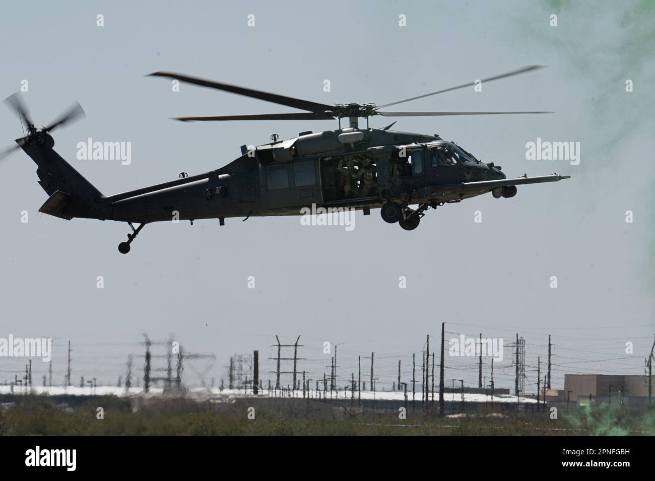 A U.S. Air Force HH-60W Jolly Green II flies over Davis-Monthan Air ...
